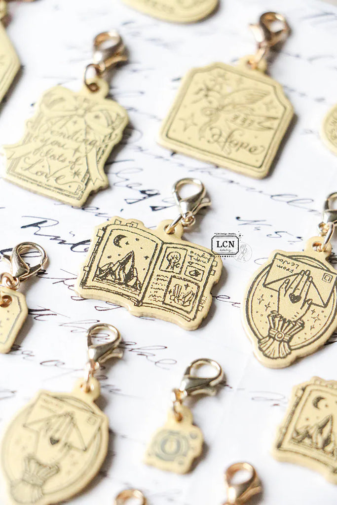 LCN Design Studio: Brass Charm (NEW) – Papergame